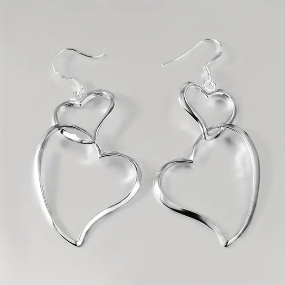 Jewelry | Nwt Interlocking Silver Heart Earrings | Poshmark